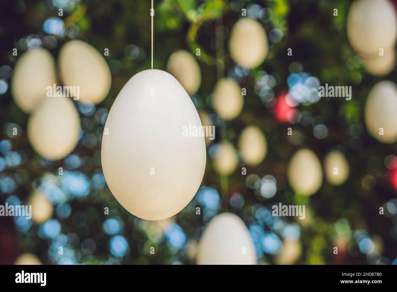 Easter eggs hang on ropes on a tree Stock Photo - Alamy