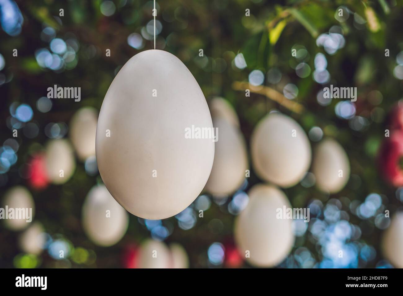 Easter eggs hang on ropes on a tree Stock Photo - Alamy