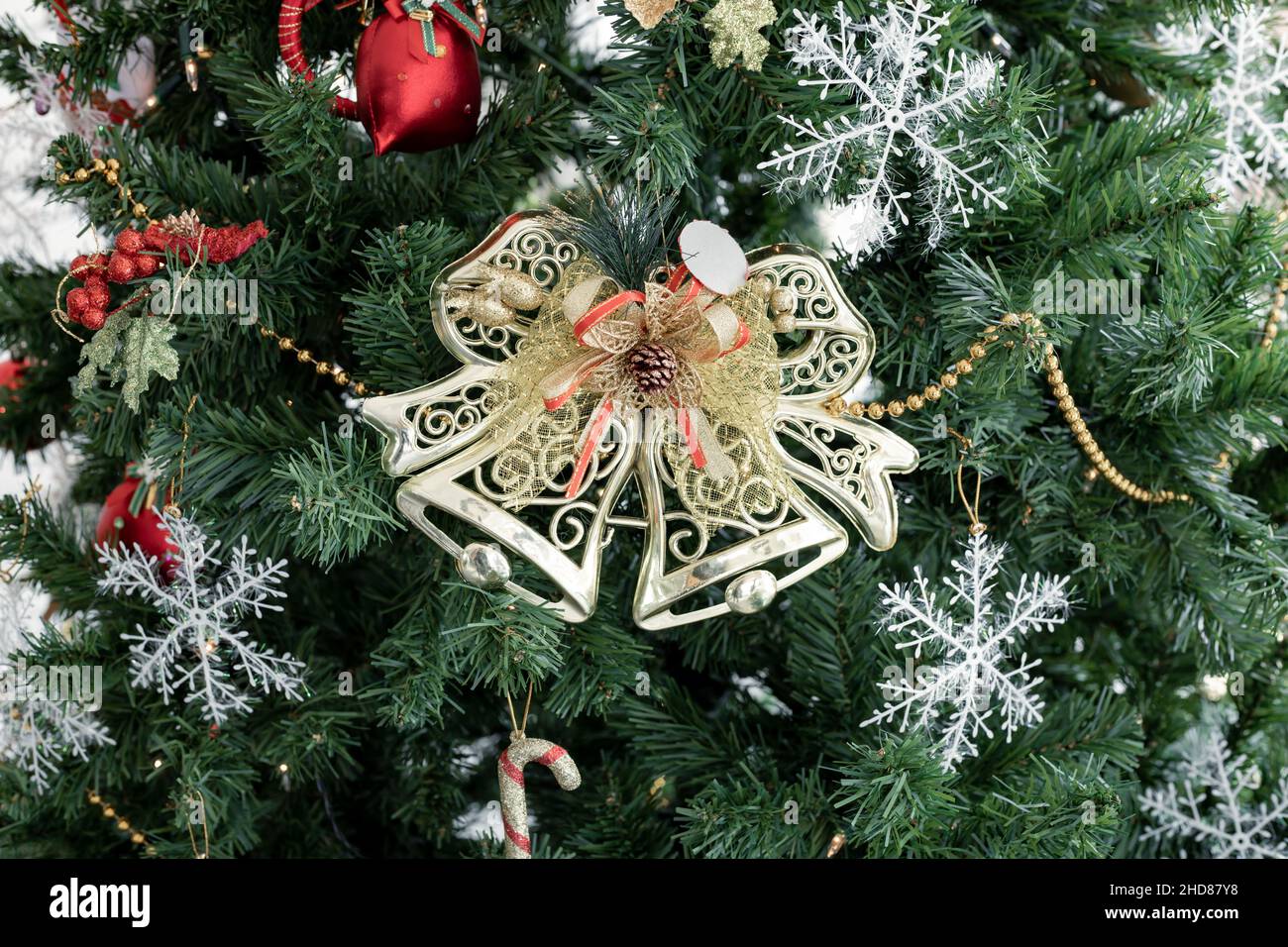 Bell hanging from tree hi-res stock photography and images - Alamy