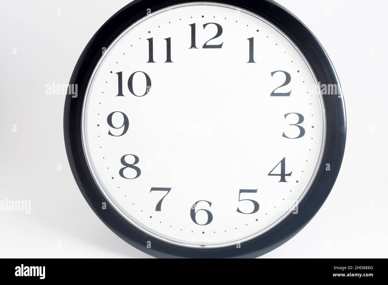 Empty black clock without dial on isolated white background with shadow ...