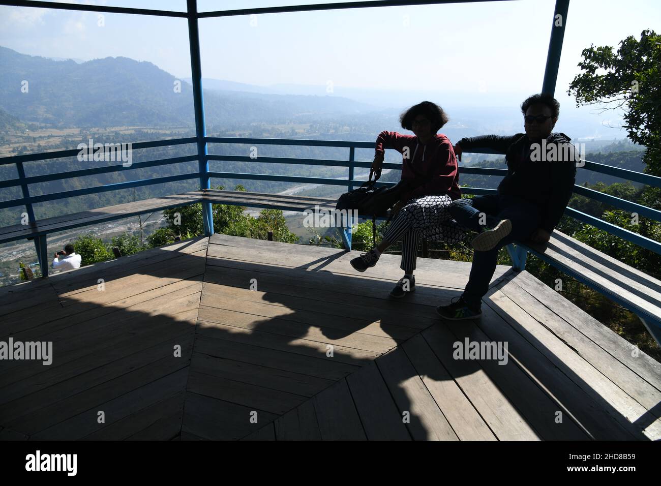 Tourists seated in observation structure. Dalgaon viewpoint (altitude ...