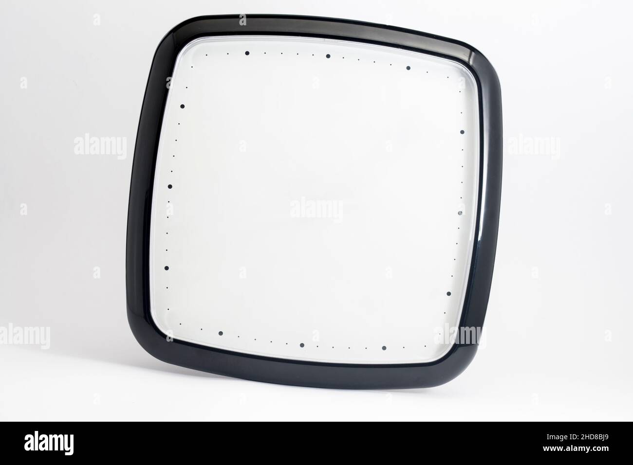 Empty black clock without dial on isolated white background with shadow ...