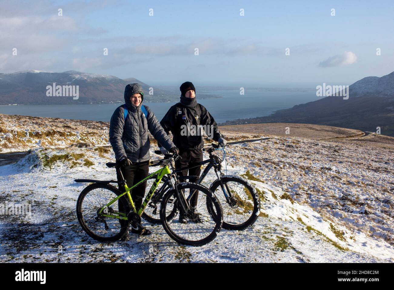 Aaron McGuinness (left) with his friend Conor Whyte take a rest after ...
