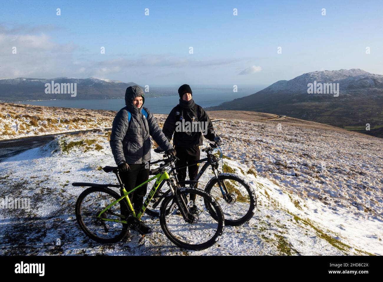 Aaron McGuinness (left) with his friend Conor Whyte take a rest after ...