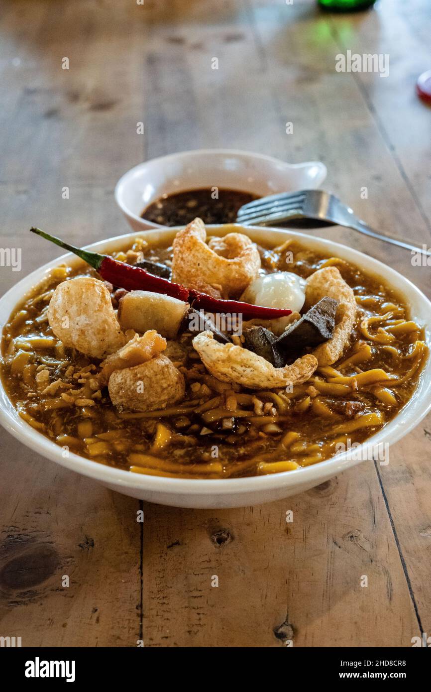 Sumptous Batangas Lomi in a bowl served hot full of toppings Stock ...