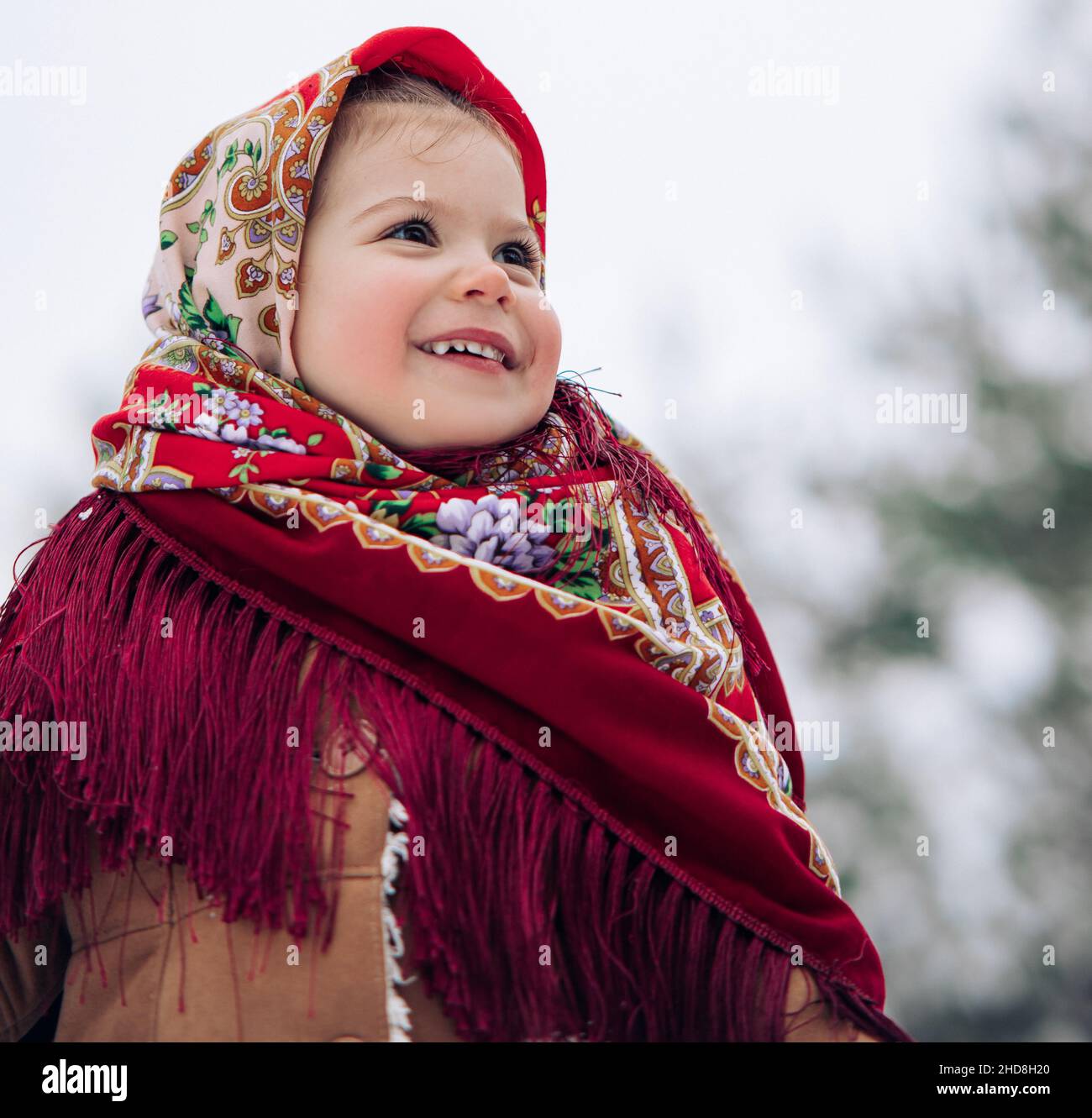 Portrait of beautiful little child girl during the walk in forest. She ...