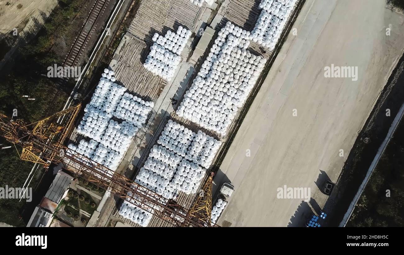 Top view of an open air warehouse with packed materials at the ...