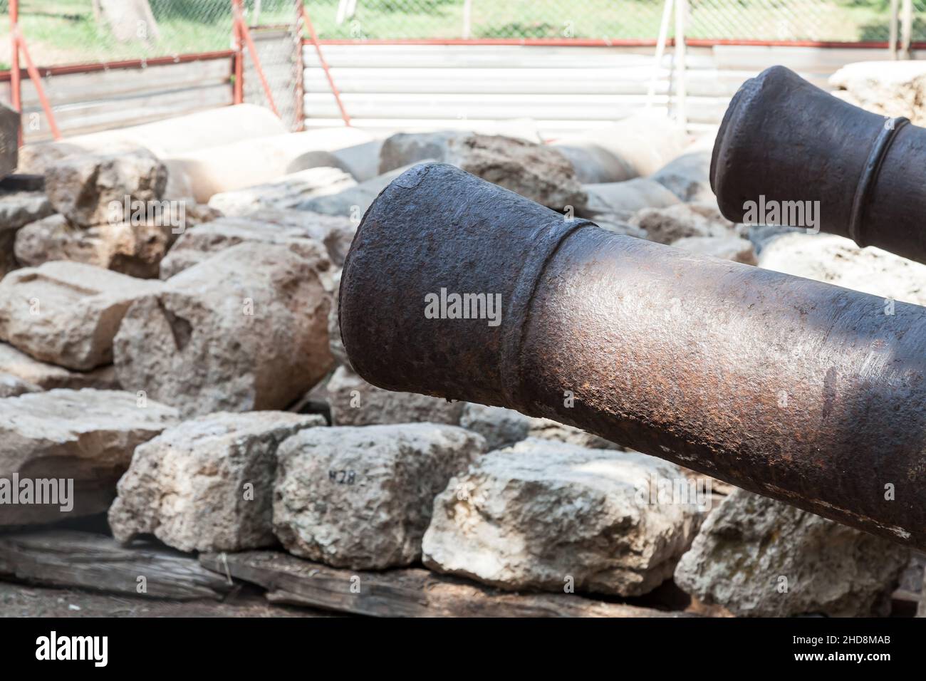 Close-up, shallow focus of an ancient, turkey wrought iron cannon ...