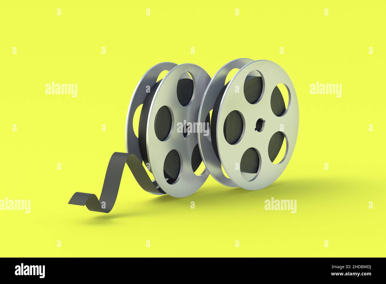 Film reel in metal frame on yellow background. Cinematography tape ...