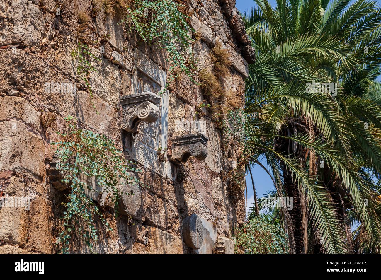 The ruins of the ancient city of Antalya. Ancient wall of rough gray ...
