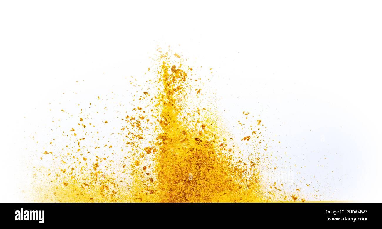 Explosion of yellow, golden color, fluid and neoned powder on white ...