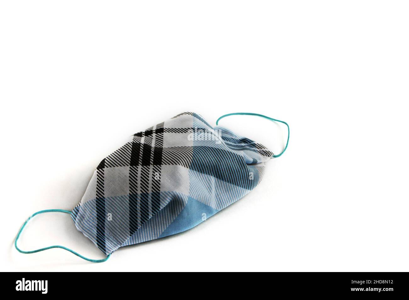 Medical textile facial mask made, isolated on white. COVID-19 Corona ...