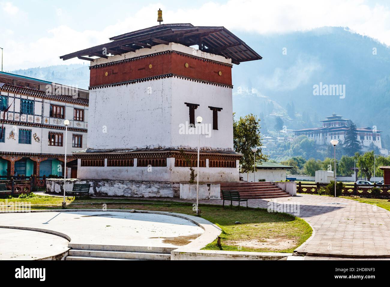 Bhutanese chorten and the Rinpun Dozng monastery in the background, in ...