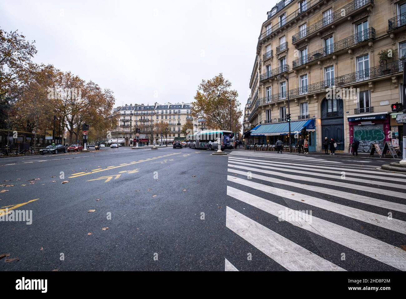 Street scene at the streets fo Paris and people walking around. Paris ...