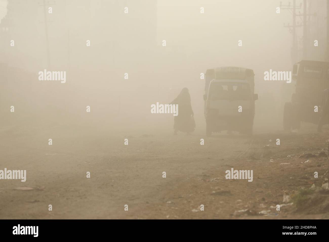 Severe dust pollution adds to commuters' woes on the road at Matuail ...