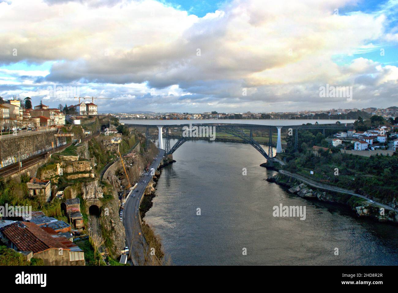 Old and new railway bridges over Douro river in Oporto, Portugal Stock ...