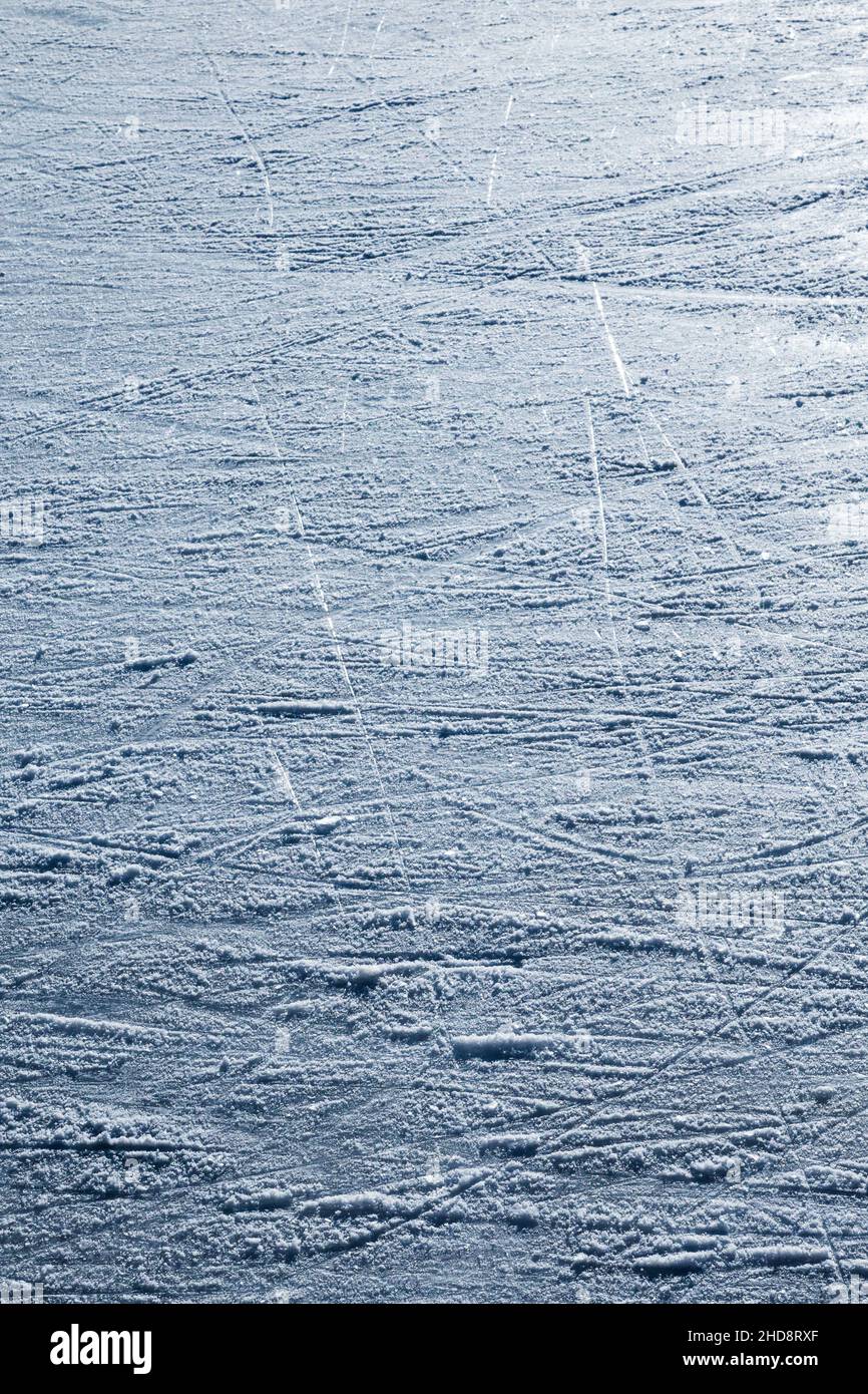 Ice skating rink, cutting ice, snow. Winter sport. Scratches on the ...