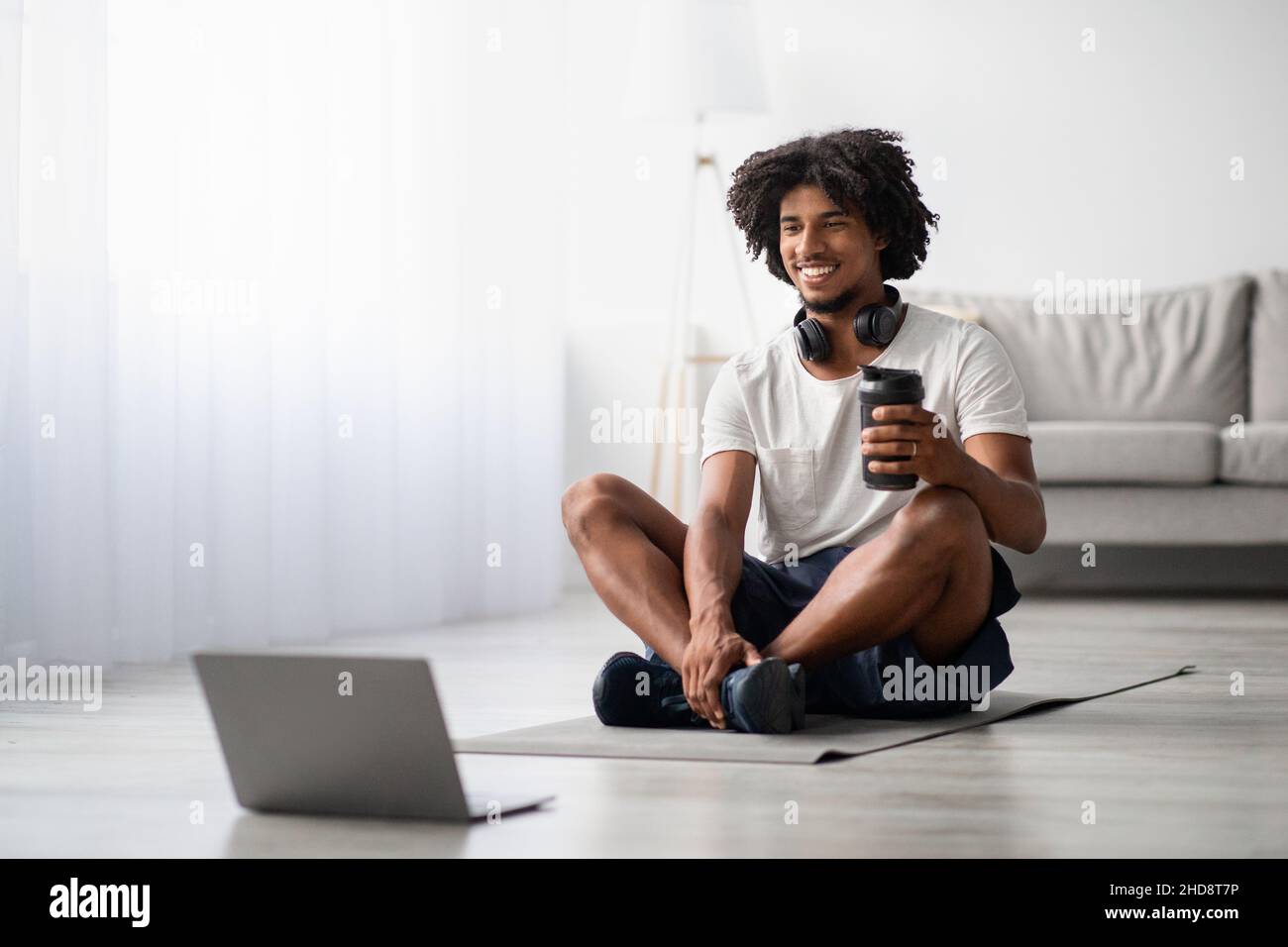 Young Black Guy Training At Home With Online Tutorials On Computer ...