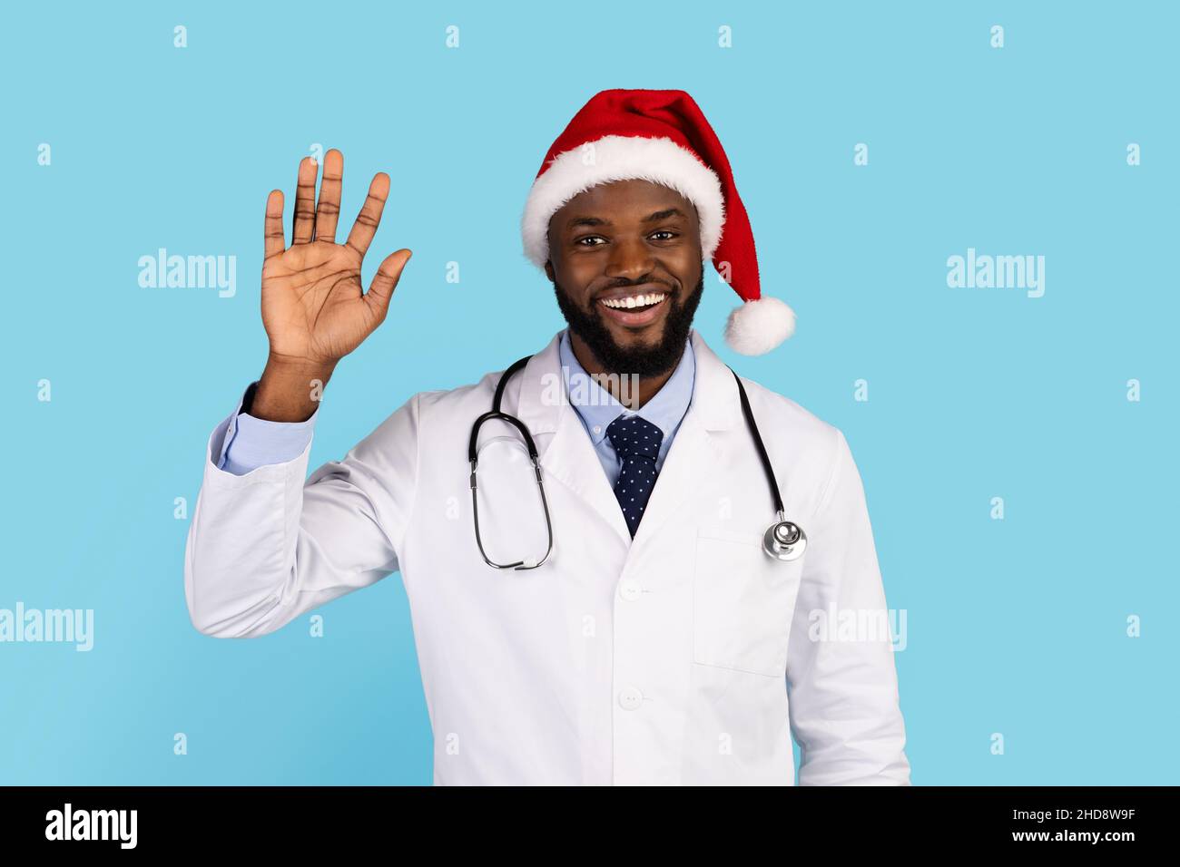 Black doctor in blue hi-res stock photography and images - Alamy