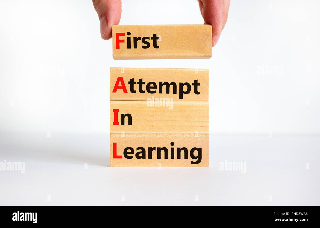 FAIL first attempt in learning symbol. Wooden blocks with words FAIL ...