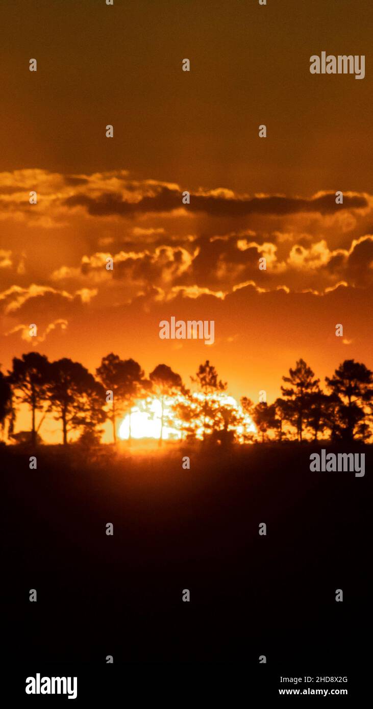 A mesmerizing view of the sunset over the countryside Stock Photo - Alamy