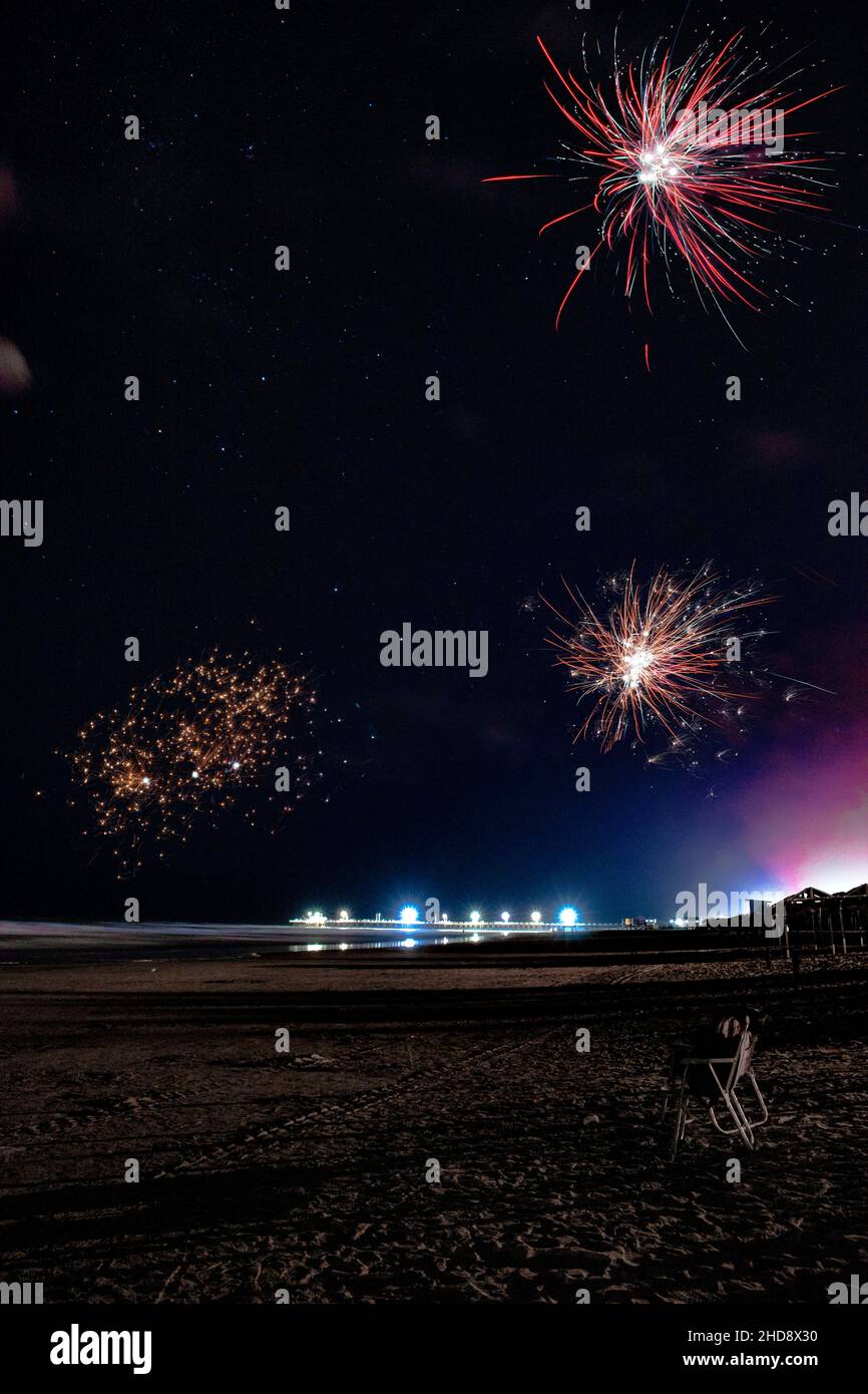 Dazzling firework exploding in the night sky Stock Photo - Alamy