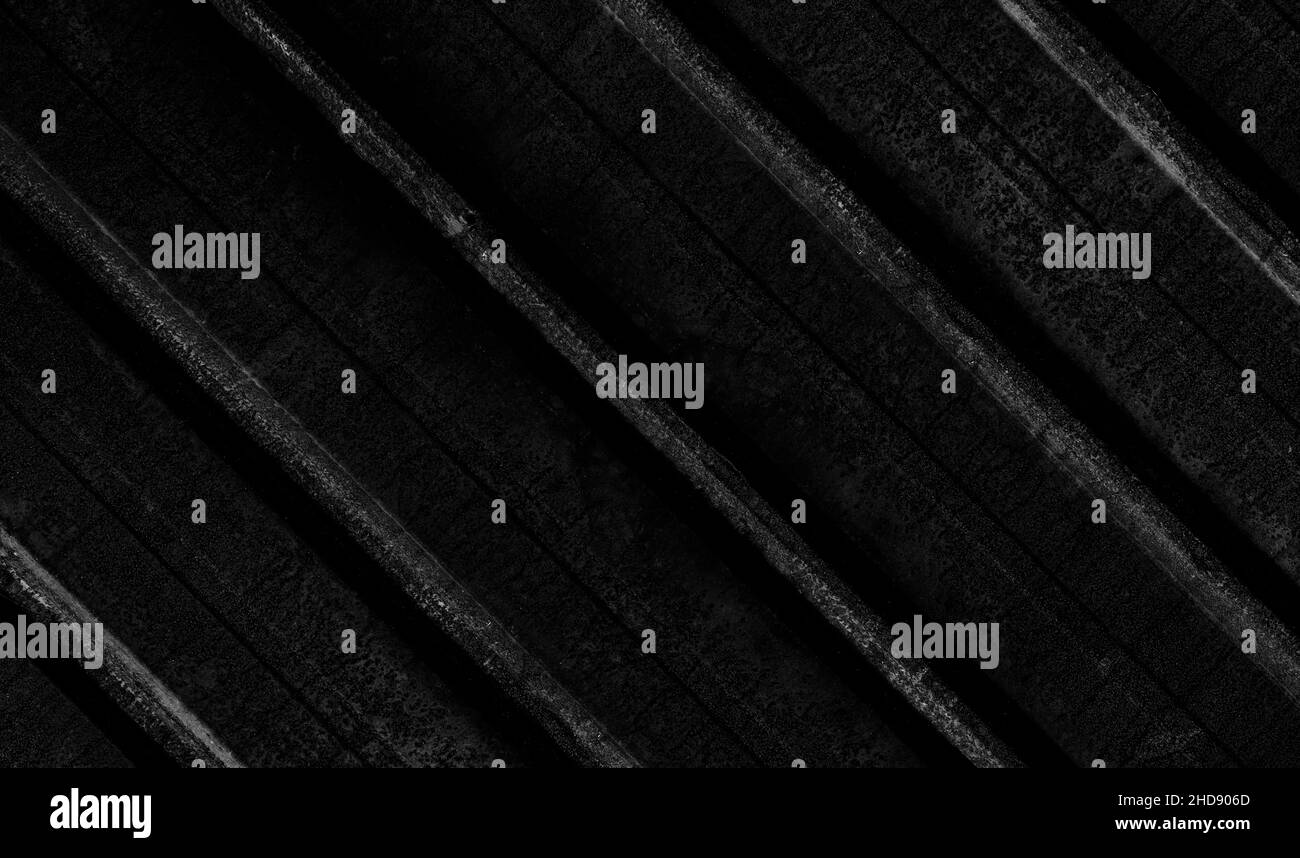 Abandoned old industrial iron metal sheet close up view for dark ...