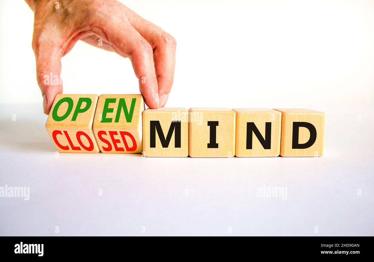 Open or closed mind symbol. Businessman turns cubes and changes concept ...