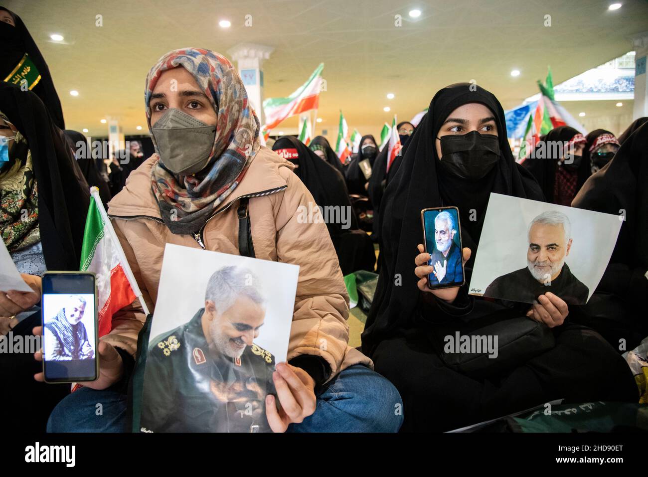 (1/3/2022) Two women hold poster of the Iranian former Islamic ...
