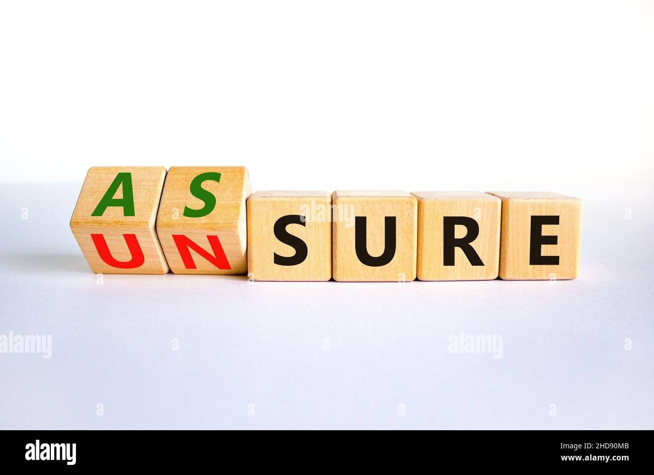 Assure or unsure symbol. Turned wooden cubes and changed the concept ...