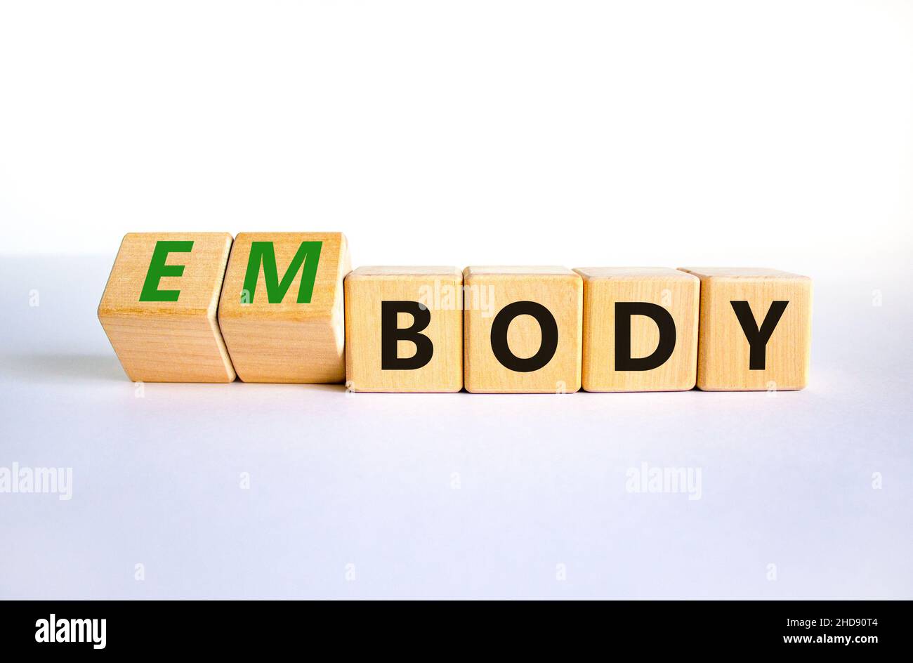 Body and embody symbol. Turned wooden cubes and changed the concept ...