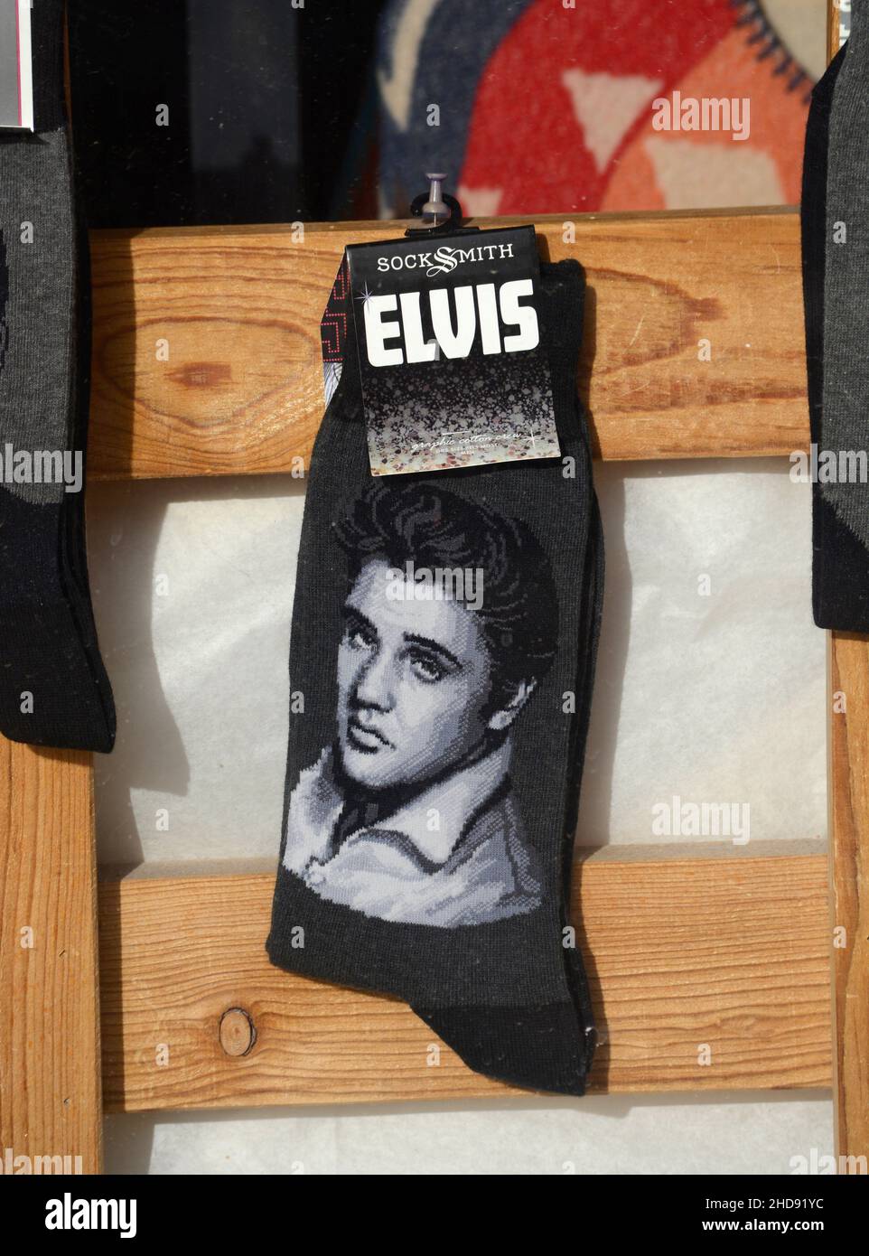 A window display of Socksmith and Hotsox brand novelty socks portraying ...