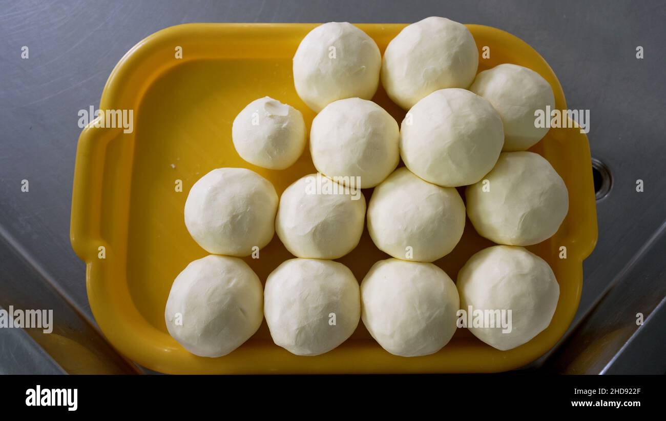 Homemade butter on a tray. Production of butter on an industrial scale ...