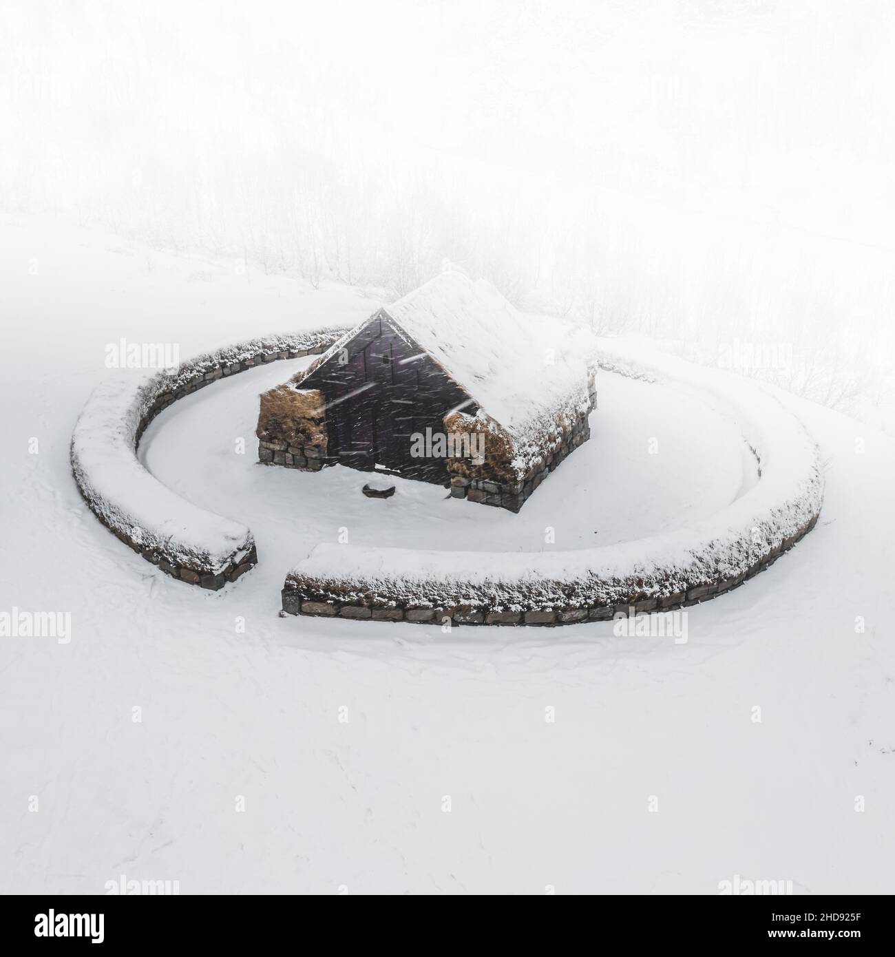 Vertical shot of a building covered by snow Stock Photo - Alamy