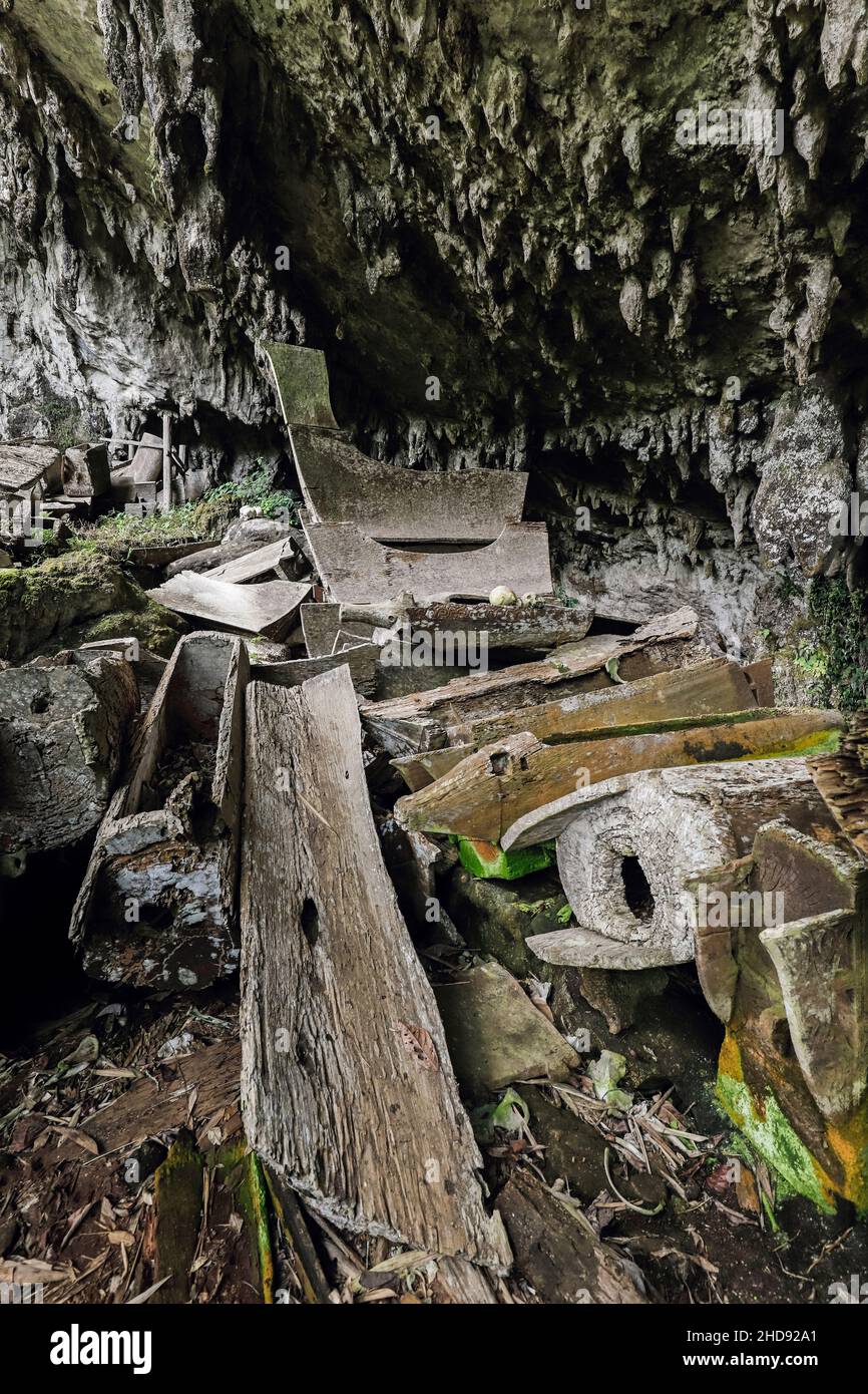 Weathered coffins (erong) in the 700 yr old burial cave at Lombock ...