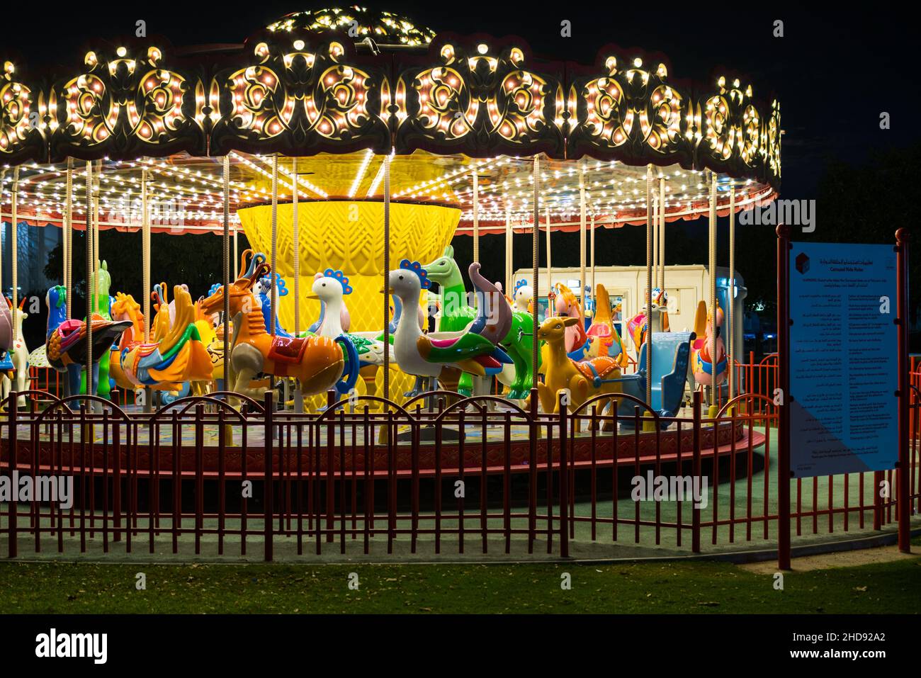 Funfair rides at night Stock Photo - Alamy