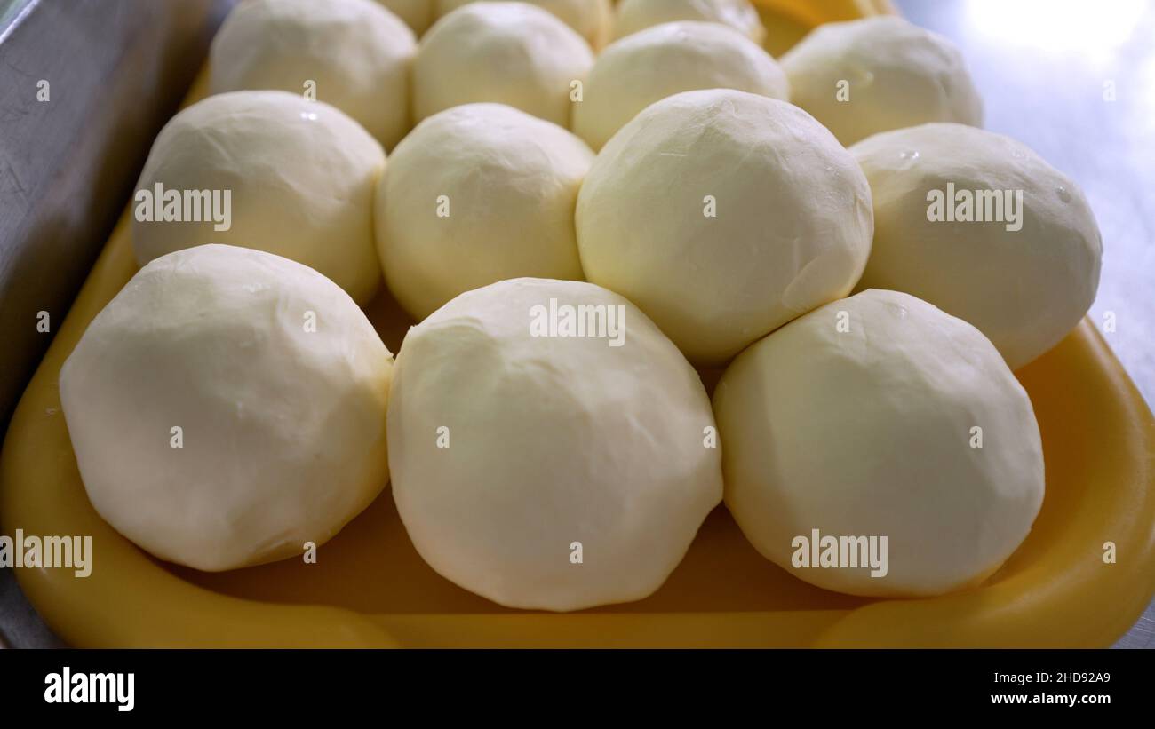 Homemade butter on a tray. Production of butter on an industrial scale ...