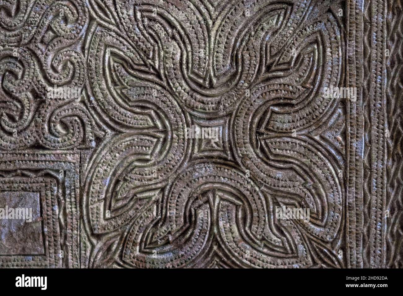 Weathered geometric carving on coffin (erong) in the 700 yr old burial ...