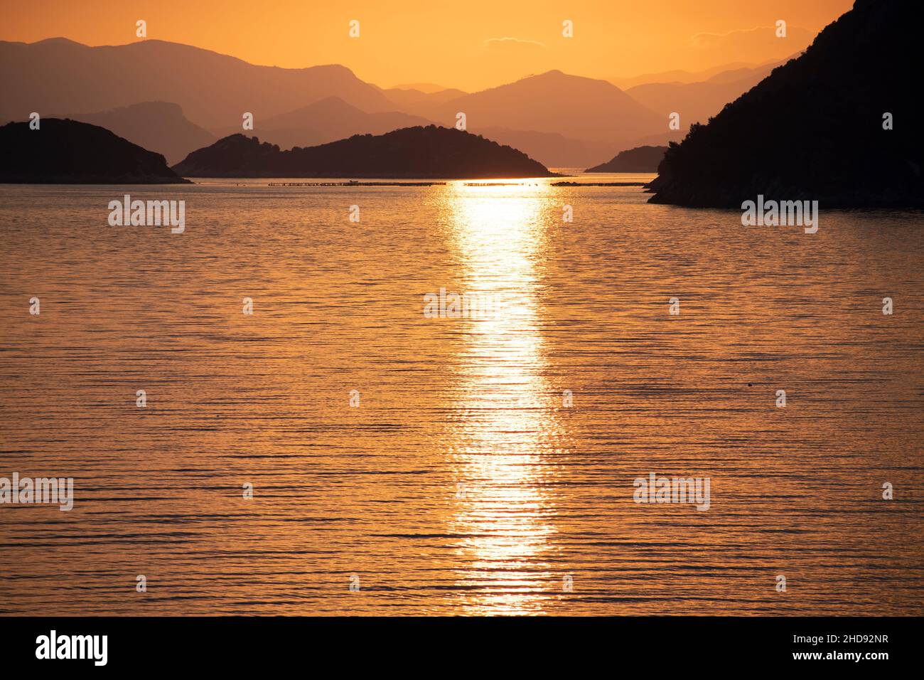 Golden sunset with islands hi-res stock photography and images - Alamy