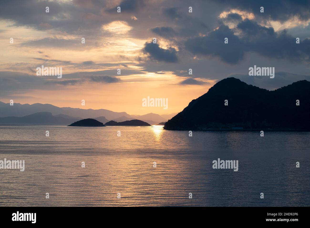 Golden sunset with islands hi-res stock photography and images - Alamy