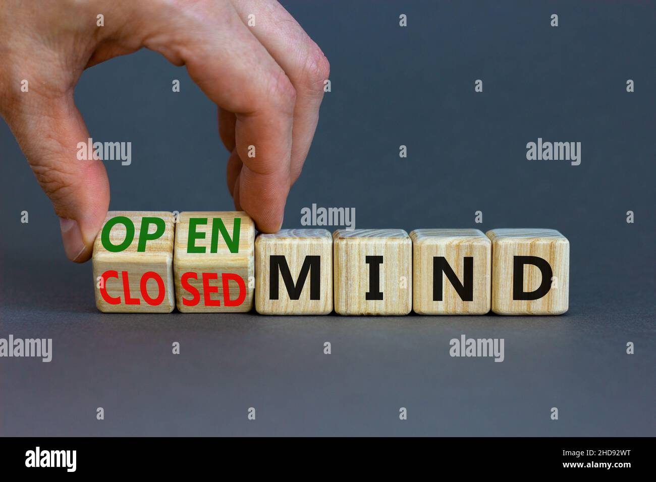 Open or closed mind symbol. Businessman turns cubes and changes concept ...