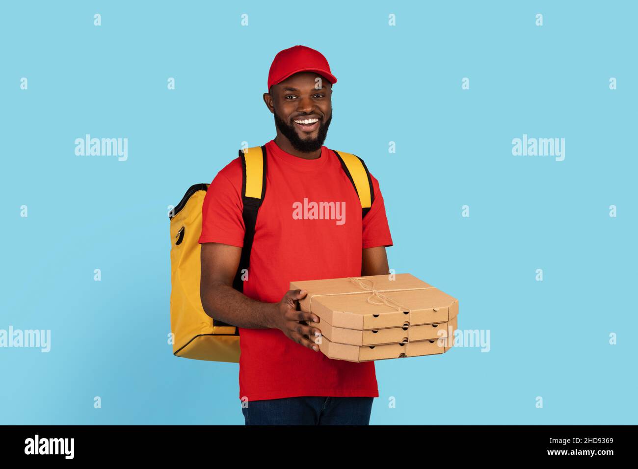 African american delivery man carrying hi-res stock photography and ...