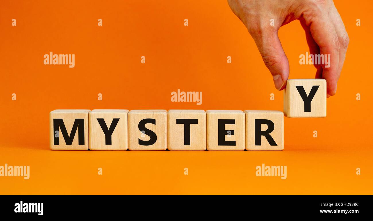 Mystery symbol. The concept word Mystery on wooden cubes. Beautiful ...