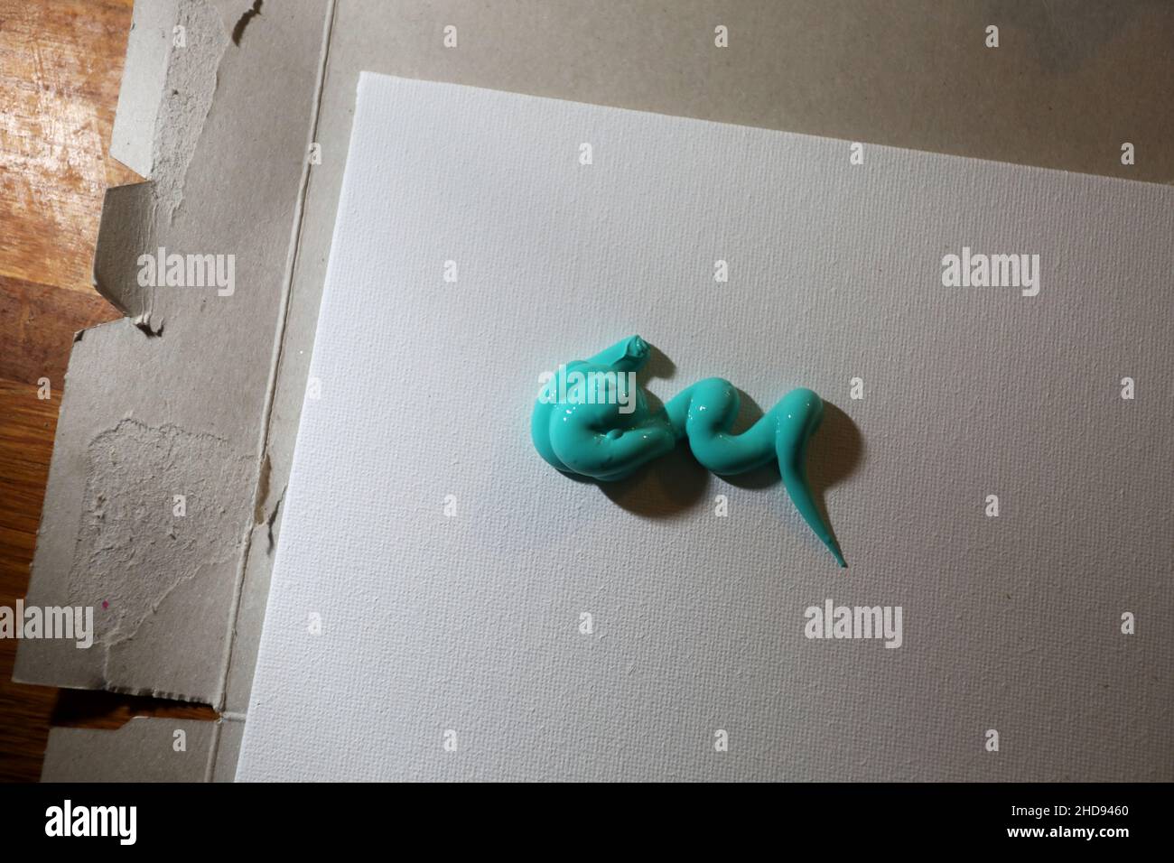 Teal acrylic paint on a canvas in Chichester, West Sussex, UK Stock ...