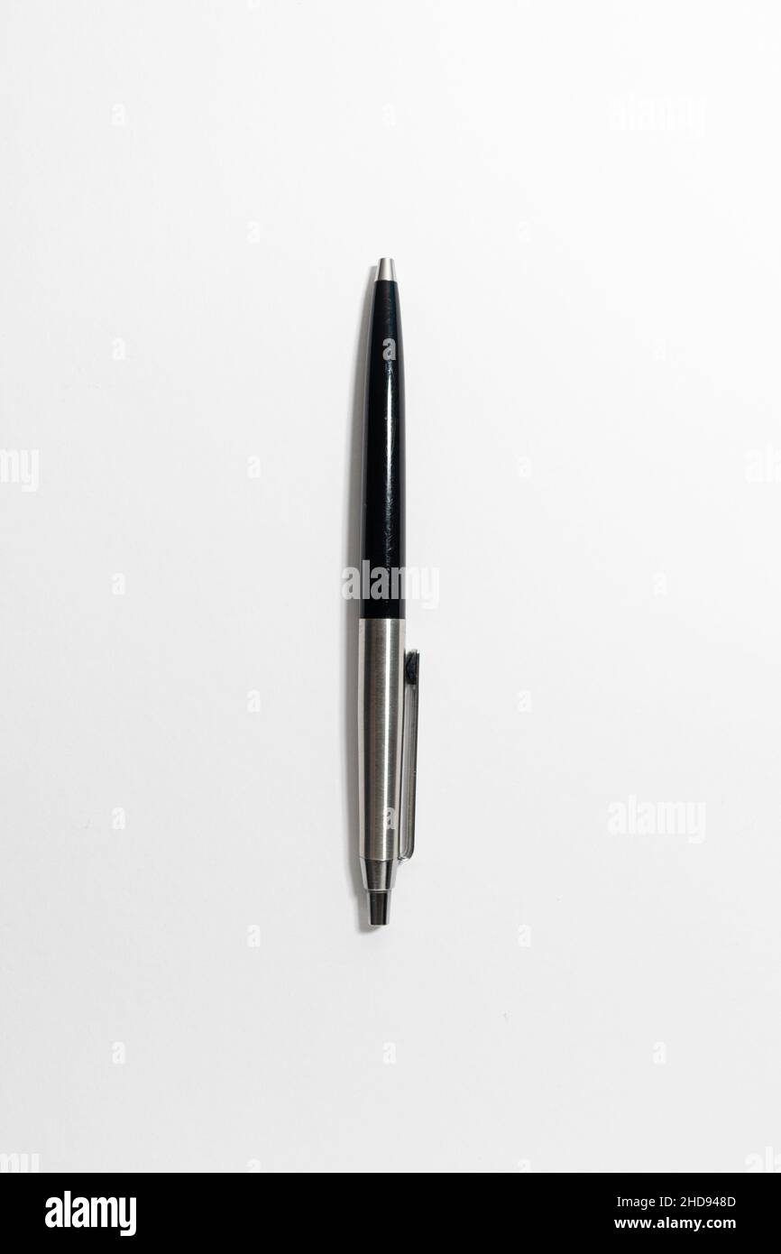 Blue Pen on white board Stock Photo - Alamy