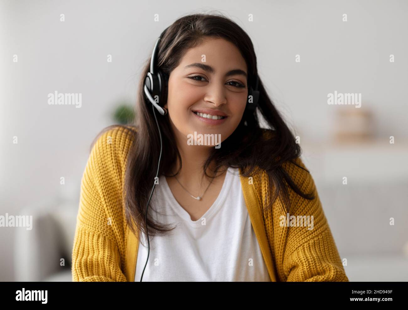 Operator of hot line. Portrait of friendly arab customer service ...