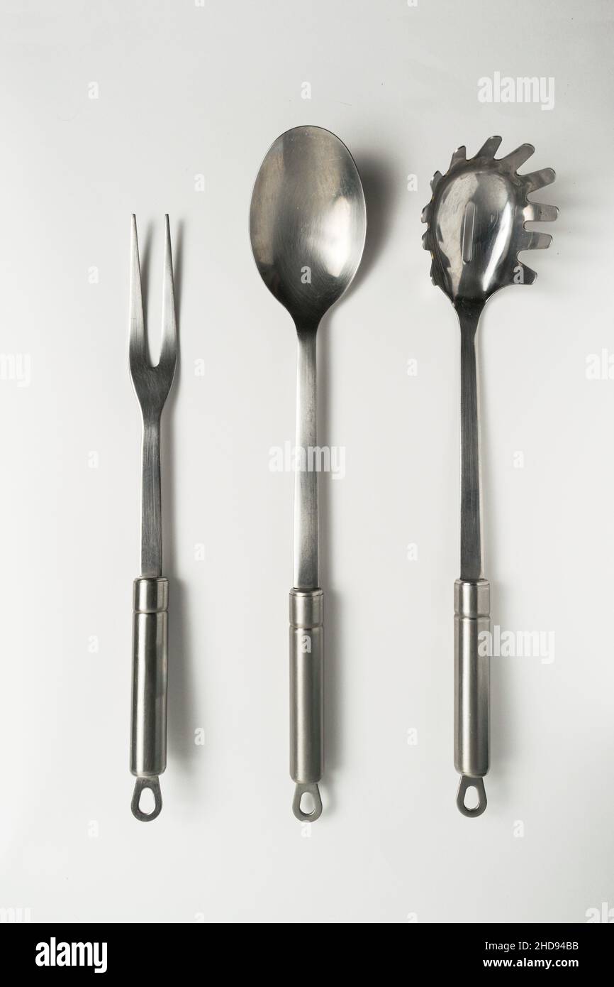 Shiny aluminium cooking utensils hi-res stock photography and images ...