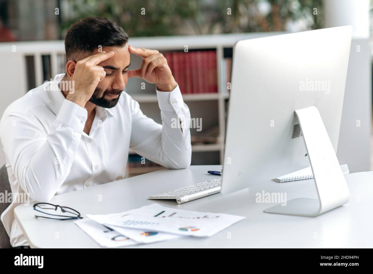 Indian man stressed work hi-res stock photography and images - Alamy