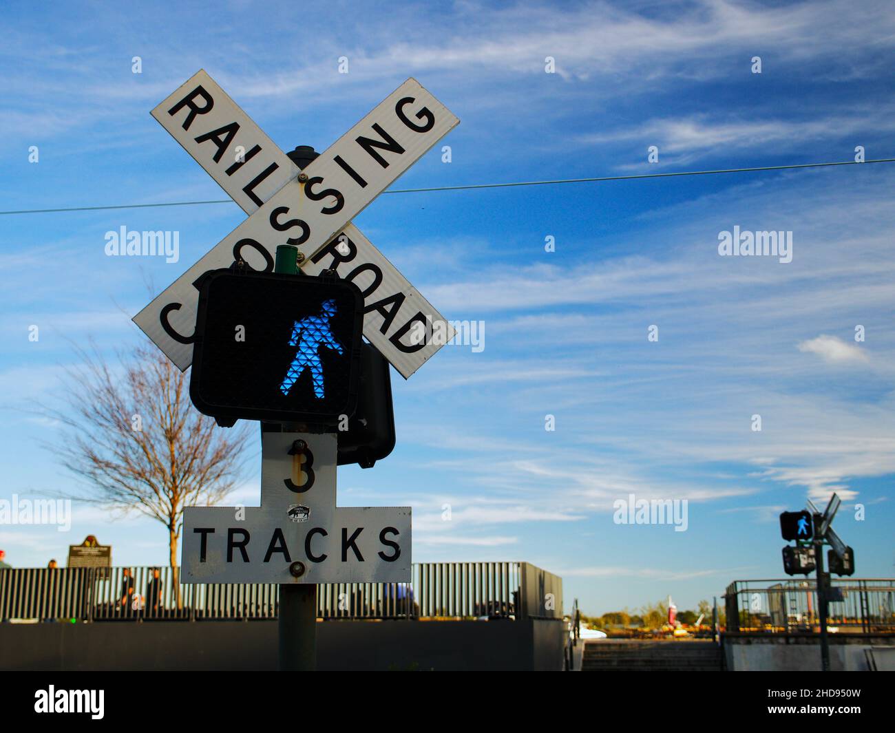 Street sign with a traffic light in New Orleans Stock Photo - Alamy