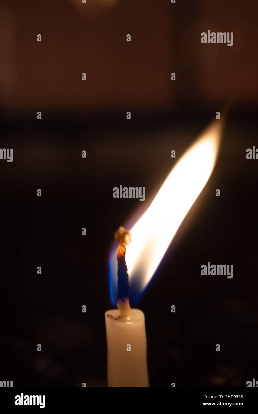 Ignited candle hi-res stock photography and images - Alamy